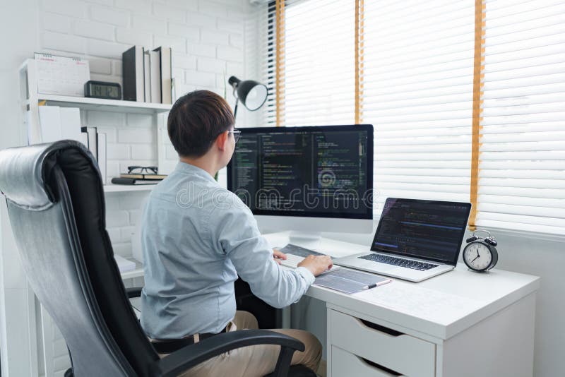 Software Development Concept Male Programmer Typing Data Code And Working On Multiple Screens 4699