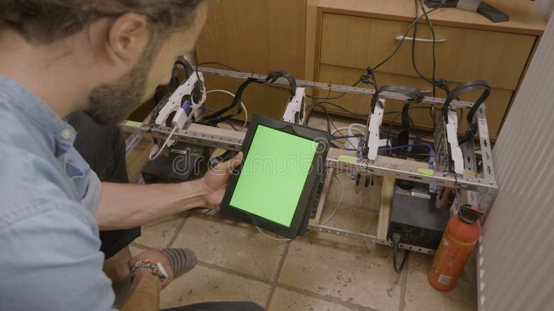 Software Engineer Checking Mining Process on Tablet Chroma Key Green ...