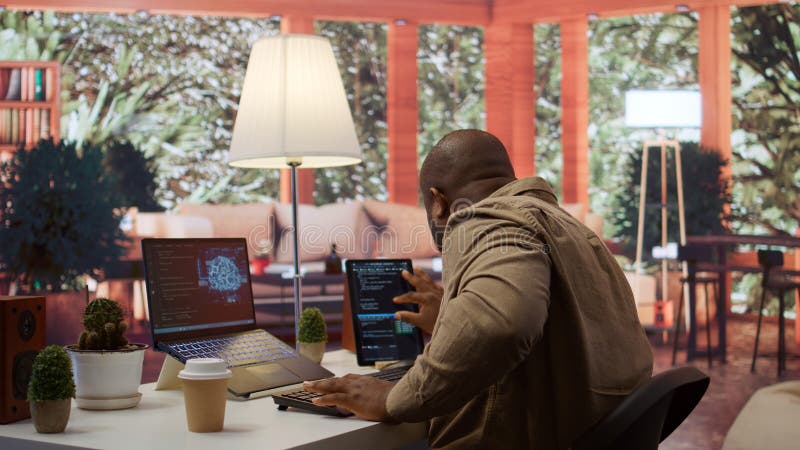 Software Engineer Coding on a Laptop Focusing on Deep Learning Stock ...