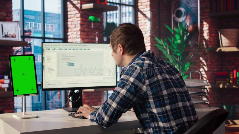Software Engineer at PC Coding, Creating Software Using Isolated Screen Tablet Stock Footage ...
