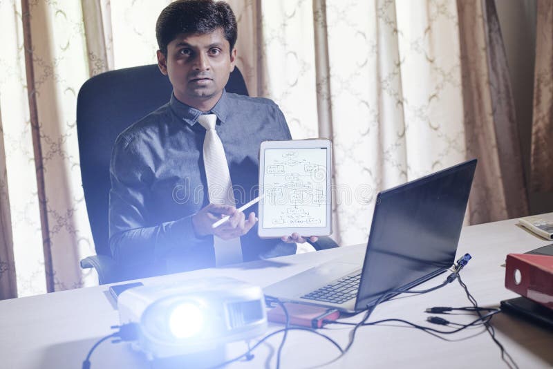 Software Engineer Explaining Flowchart Stock Photo - Image of desk ...