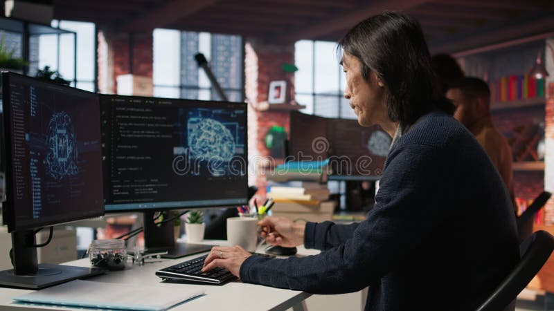 Engineer in Tech Startup Office Using AI Machine Learning Systems on PC Stock Footage - Video of ...