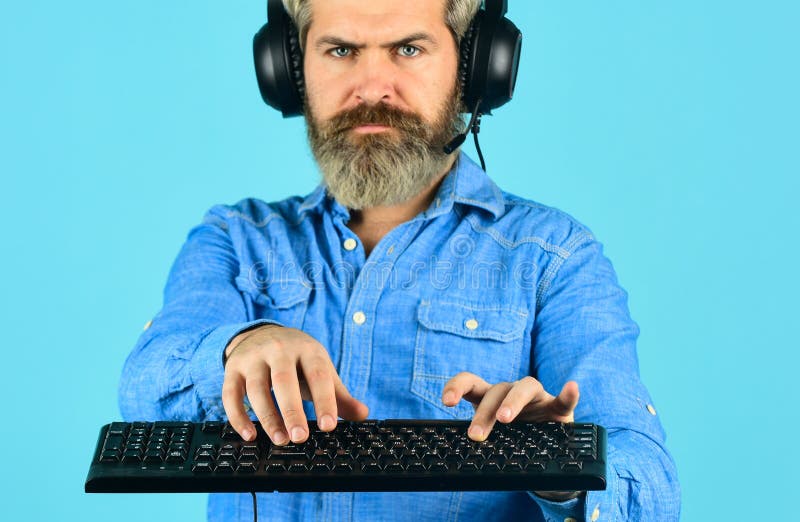 Software Engineer Working. Digital Music Creation. Bearded Man Listen ...
