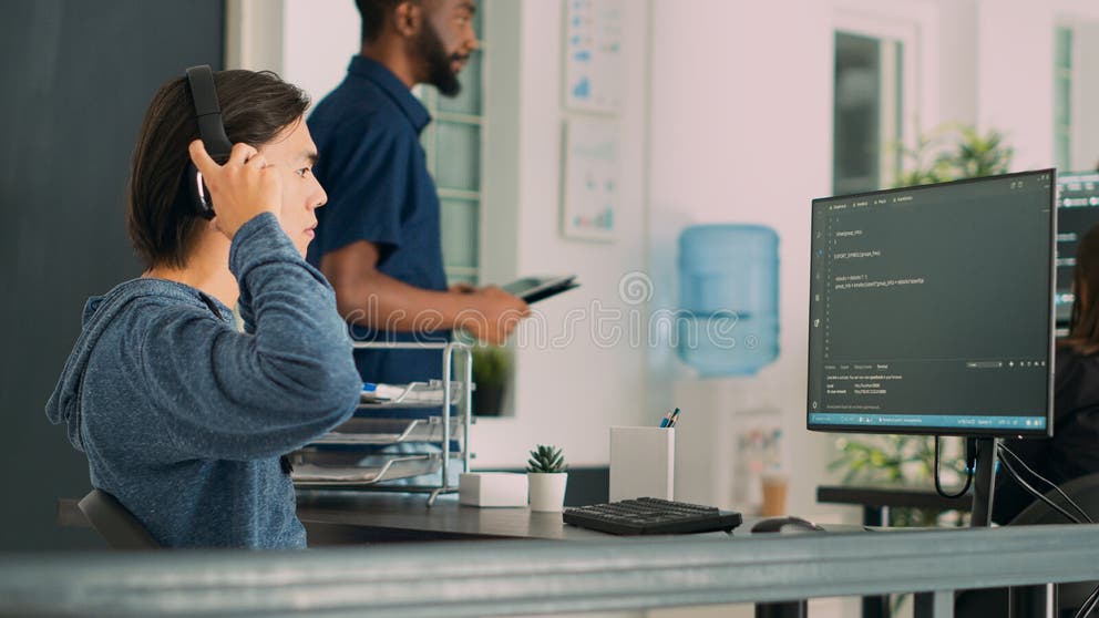 Software Engineer Working On User Interface And Writing Code With Html