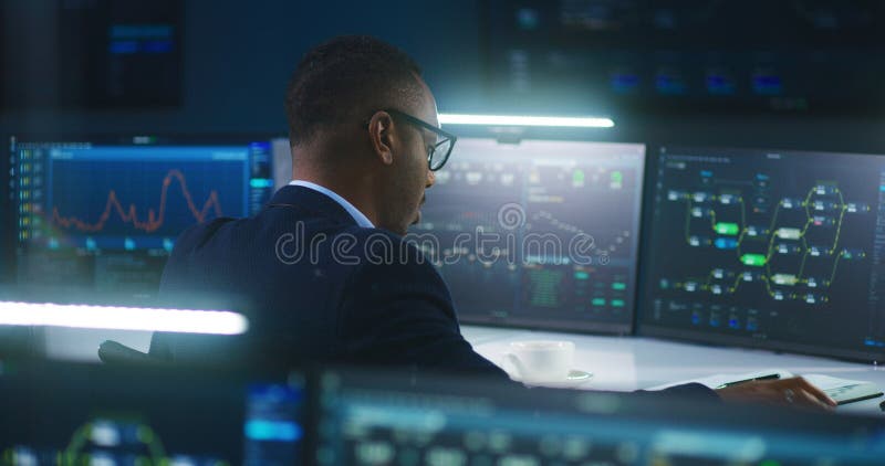 Software Engineer Works in Modern Monitoring Control Room Stock Image ...
