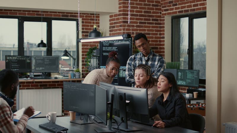 Junior Developer Putting Laptop with Source Code on Senior Dev Desk Asking for Opinion Stock ...