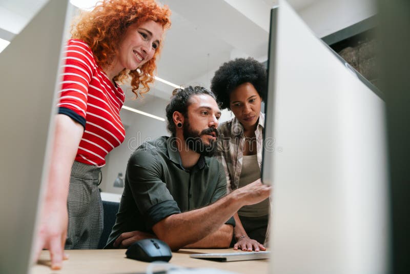 Software Engineers Working On Project And Programming In Company Stock