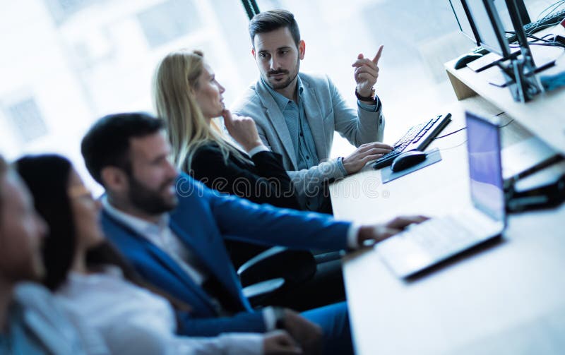 Software Engineers Working in Office on Project Together Stock Photo ...