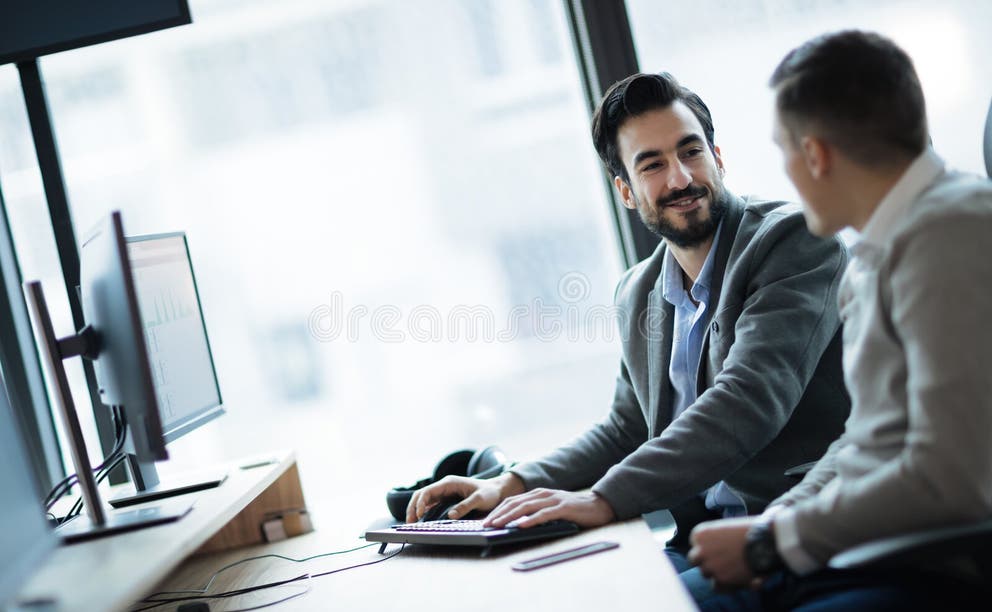 Software Engineers Working in Office on Project Together Stock Image ...