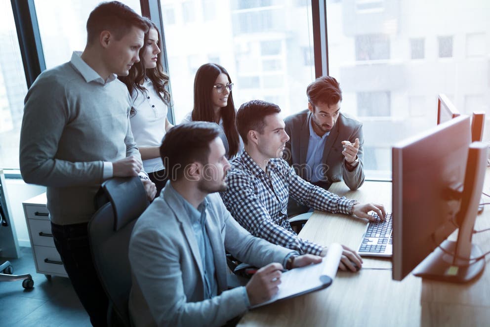 Software Engineers Working in Office on Project Together Stock Image ...