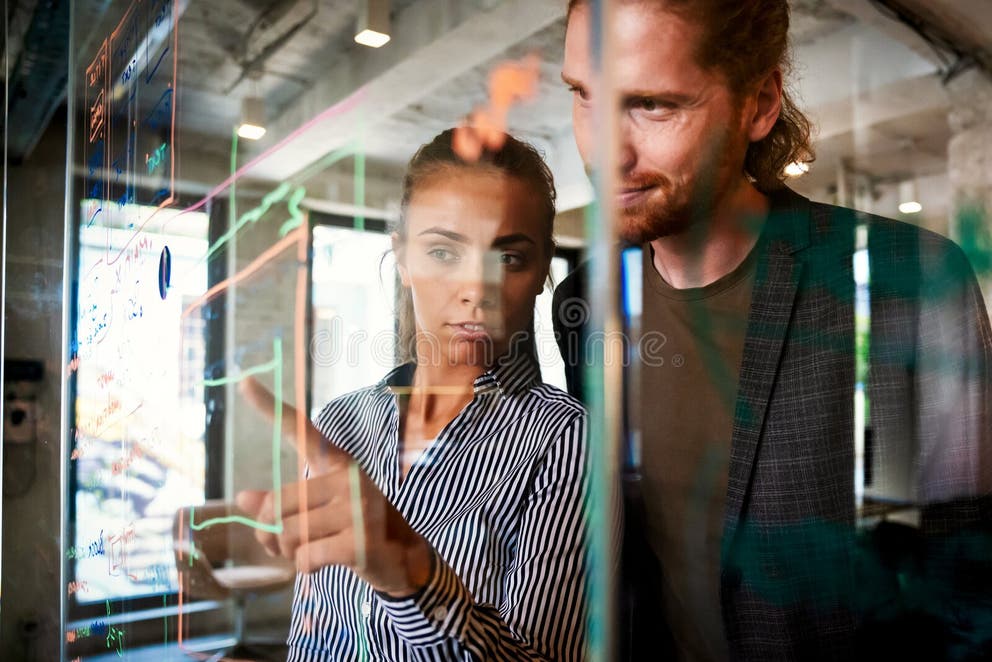 Software Engineers Working Together on Project at Tech Startup ...