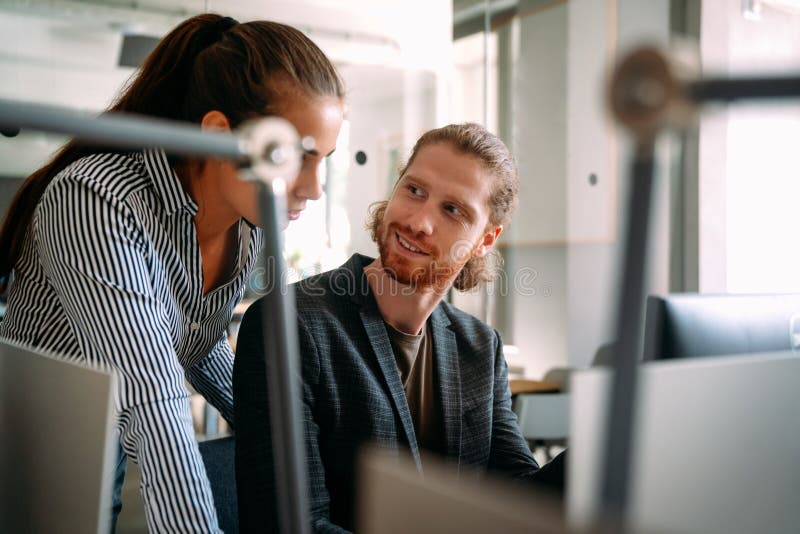 Software Engineers Working Together on Project at Tech Startup ...