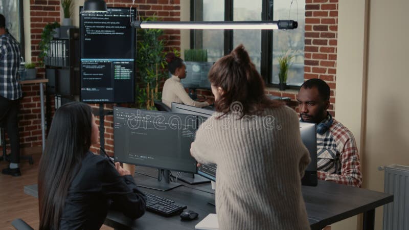 Software Programer Pointing Pencil At Source Code On Computer Screen Explaining Algorithm To
