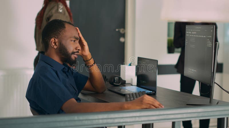 Software Programer Writing Program Code To Develop Database System