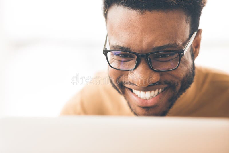 Smiling Black Man Coder Looking at Laptop Stock Image - Image of coder ...