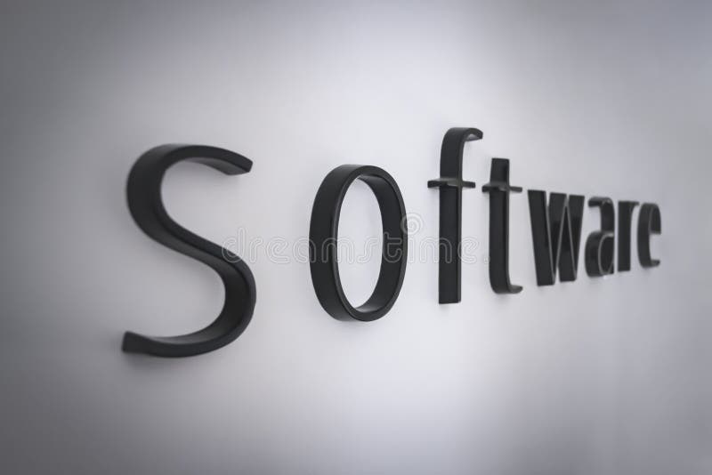 Software Word on White Painted Wall with Blurred Background. Stock ...