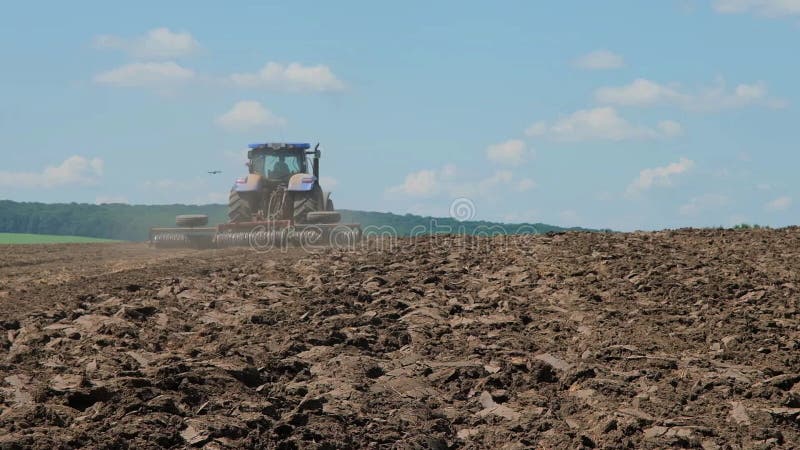 Soil Processing with a Disc Aggregate Attached To a Tractor Stock Video ...