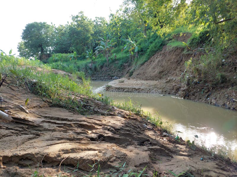 The soil and the river stock photo. Image of garden - 263663758