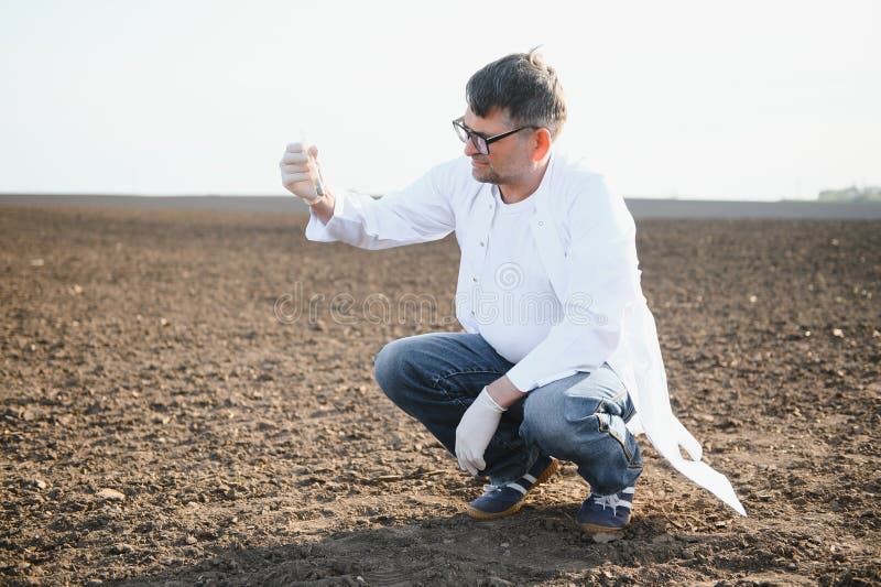 Soil Sampling. Agronomist Taking Sample with Soil Probe Sampler Stock ...