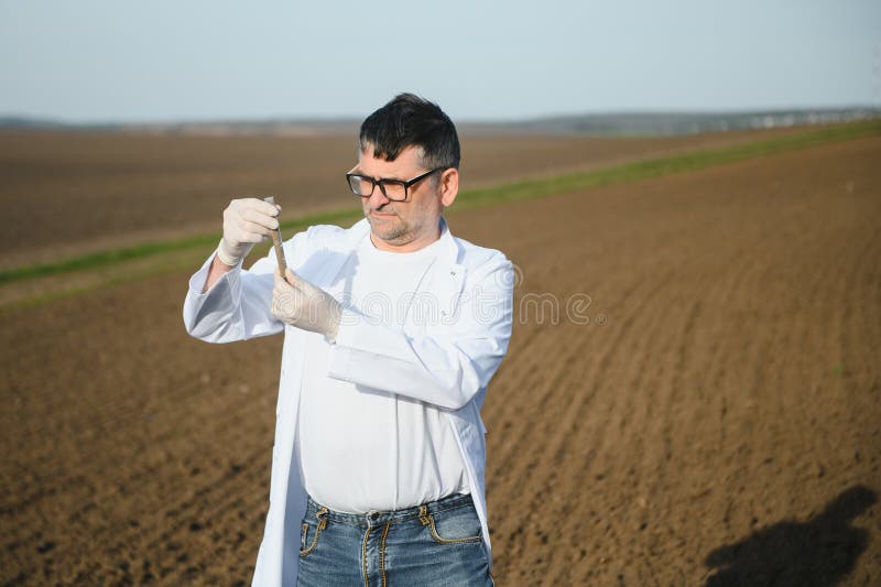 Soil Sampling. Agronomist Taking Sample with Soil Probe Sampler Stock ...