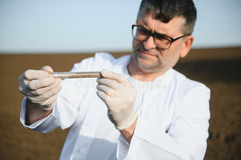 Soil Sampling. Agronomist Taking Sample with Soil Probe Sampler Stock ...