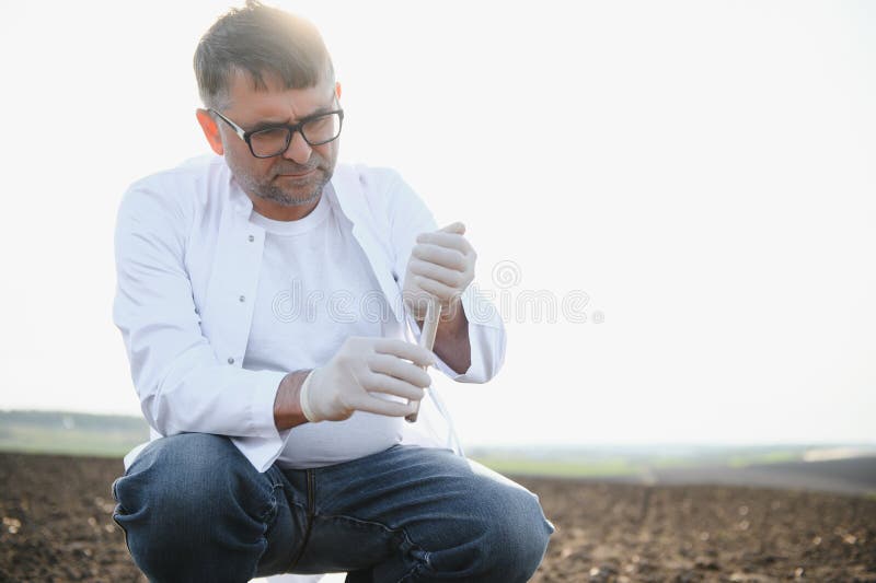 Soil Sampling. Agronomist Taking Sample with Soil Probe Sampler Stock ...