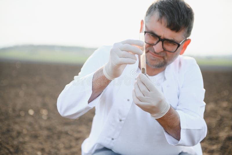 Soil Sampling. Agronomist Taking Sample with Soil Probe Sampler Stock ...