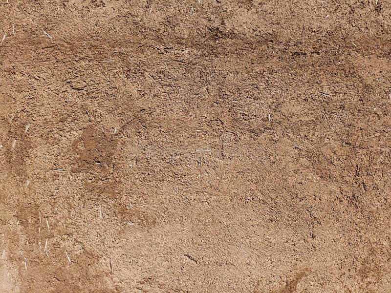 Soil Wall Texture of Adobe House Structure and Sunlight. Mud Background ...