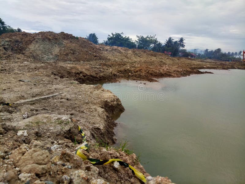 The Soil Which Results in the Creation of Puddles Stock Photo - Image ...