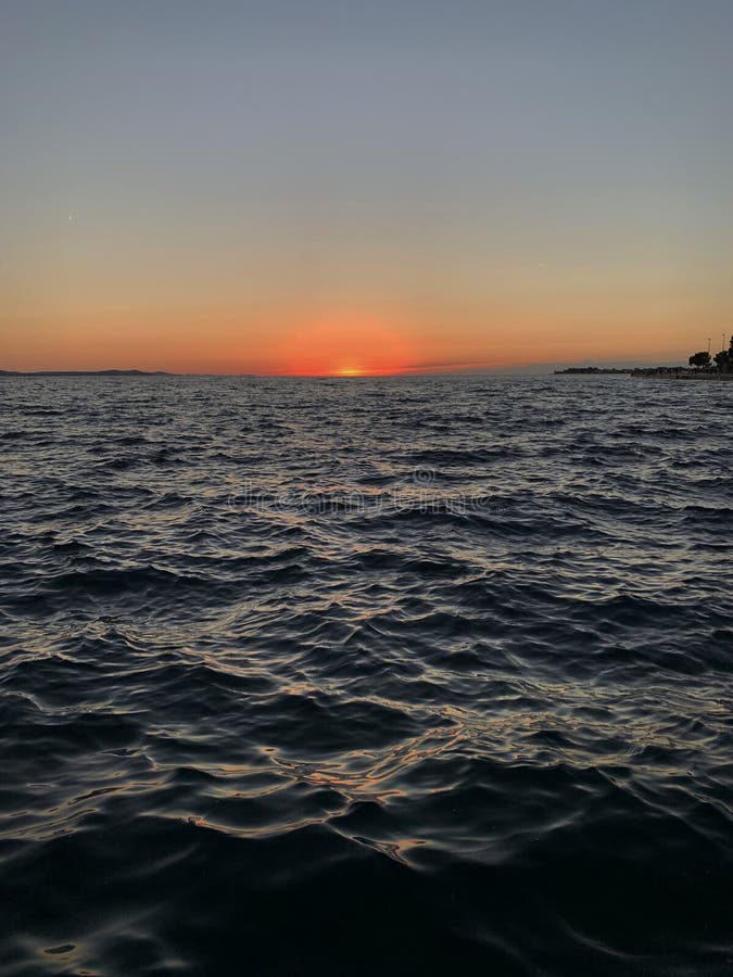 Sol de mar de sol foto de archivo. Imagen de rojo, cielo - 251984828