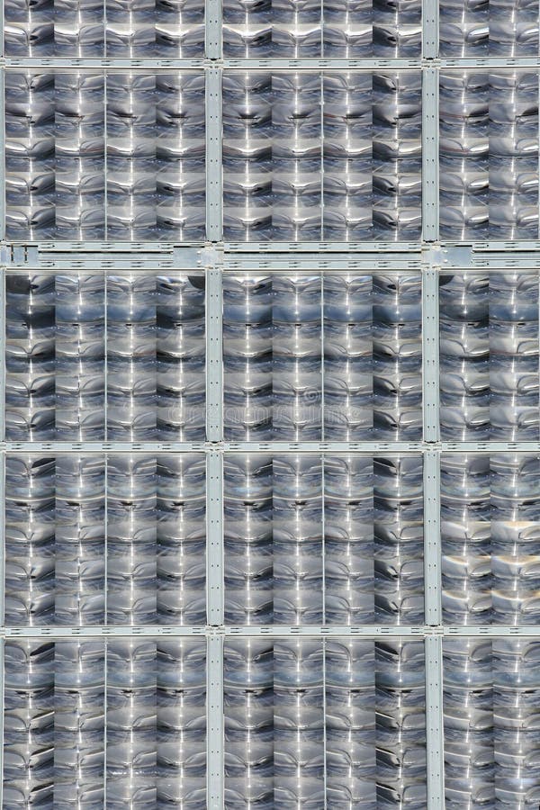A Closeup of the Fresnel Lenses and Solar Cells in a Large Solar Array ...