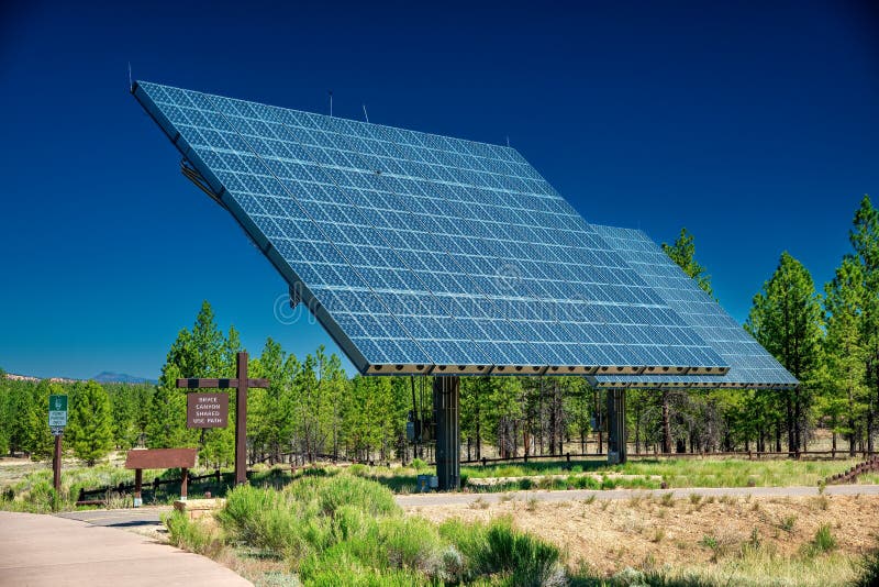 Solar Array of Panels on a Beautiful Countryside Under a Blue Summer ...