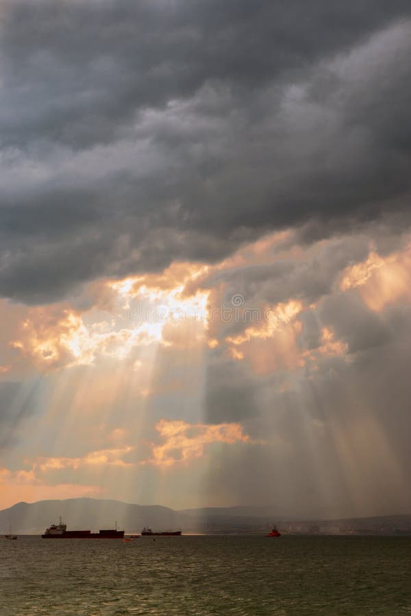 Solar Beams Breaking through Clouds Stock Photo - Image of fantastic ...
