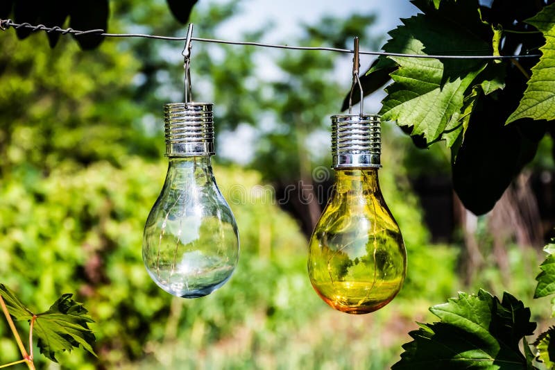 Solar Bulbs Hanging on a Wire To Charge Stock Image - Image of glowing ...