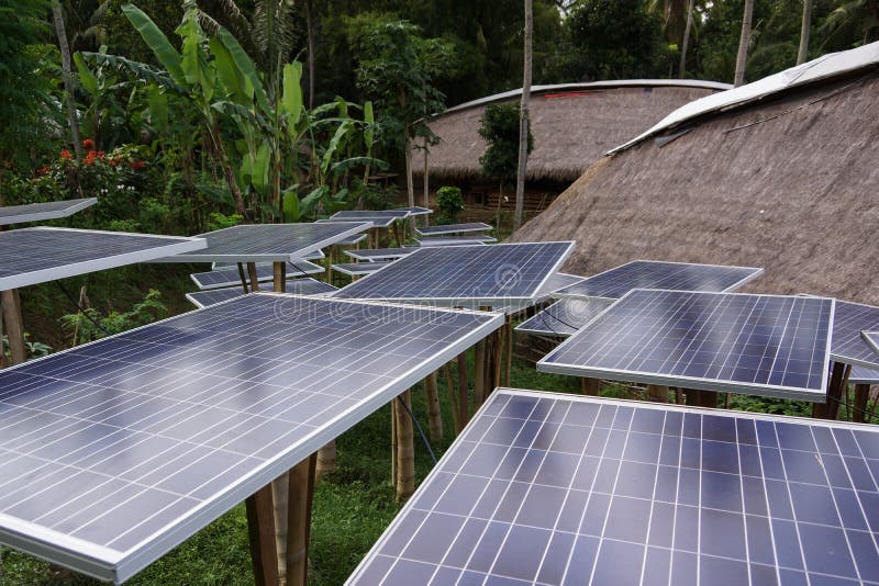 Solar cell farm in village stock image. Image of cells - 69108009