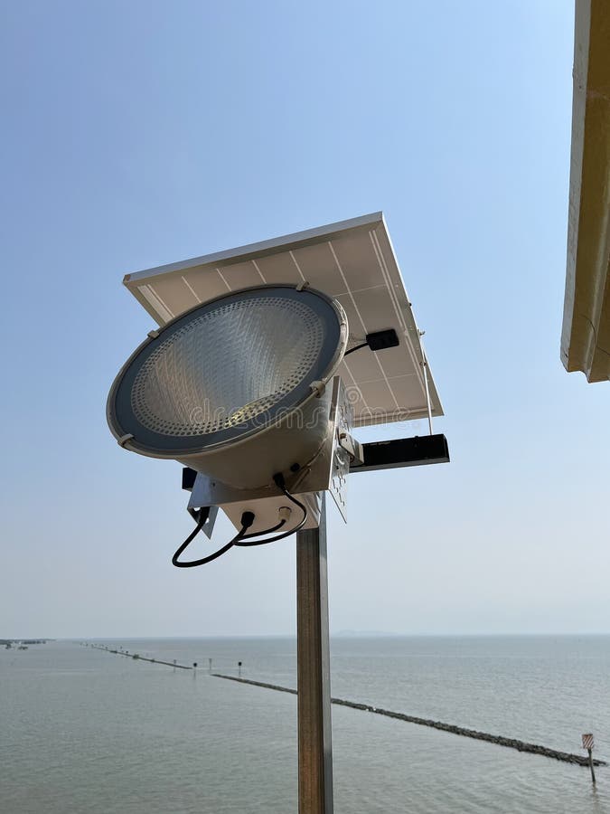 Solar Cell and Light Post Neat the Sea Stock Photo - Image of ocean ...
