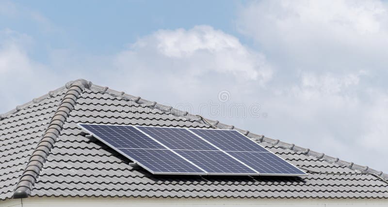 Solar Cell Panel on Roof with Blue Sky and Cloud Background Stock Photo ...