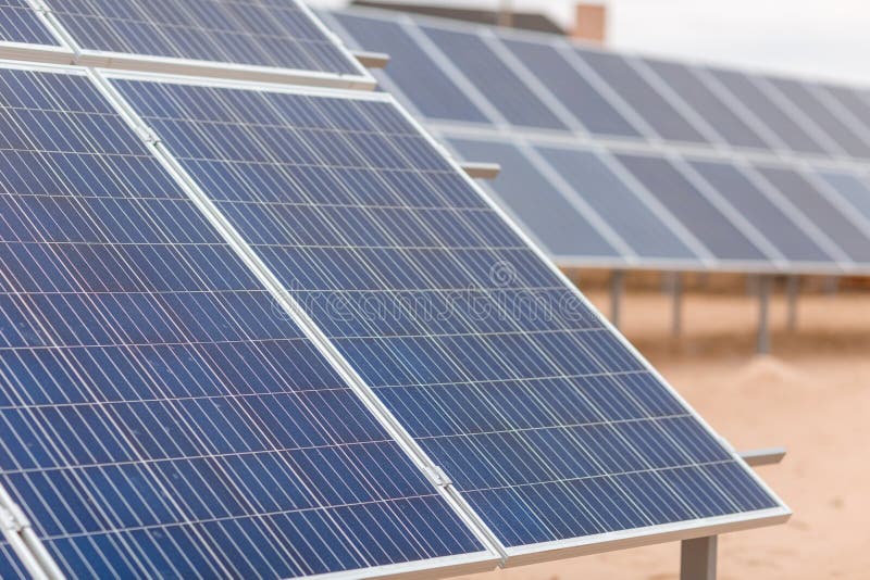 The Solar Cell Section on the Blurred Background of Other Solar Panels ...