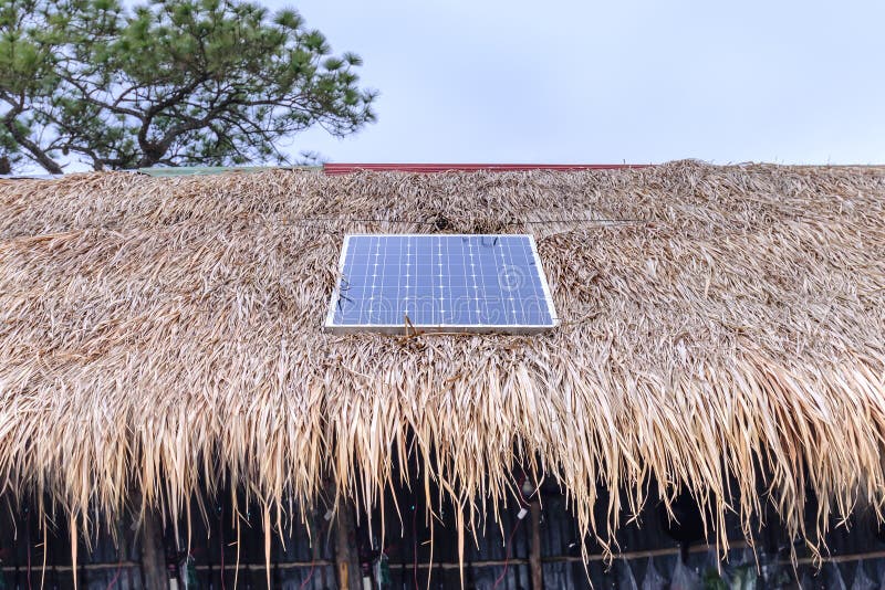 Solar Cell on Thatched Roof for Energy in Forest Stock Image - Image of ...