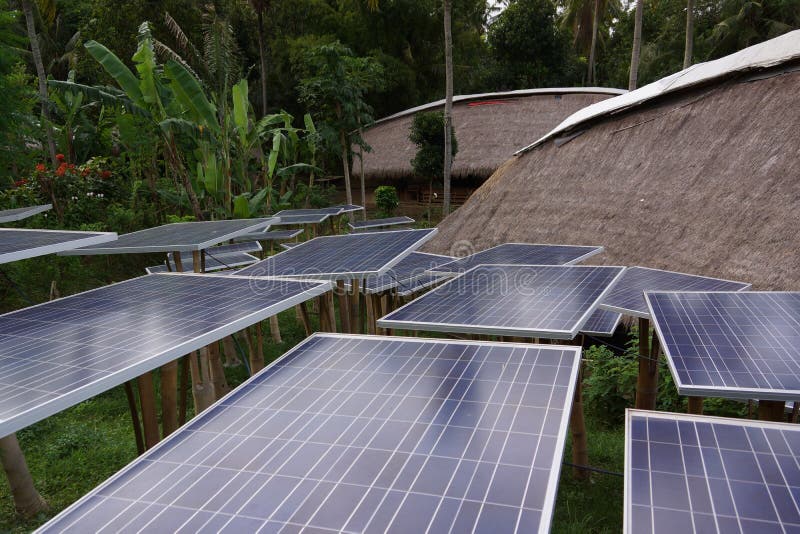 Solar Cell Tree in Green Village Stock Photo - Image of cells, blue ...
