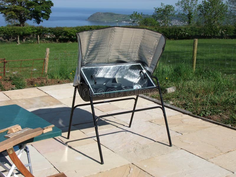 Solar Cooking in a Converted Bbq Solar Oven Stock Photo - Image of ...