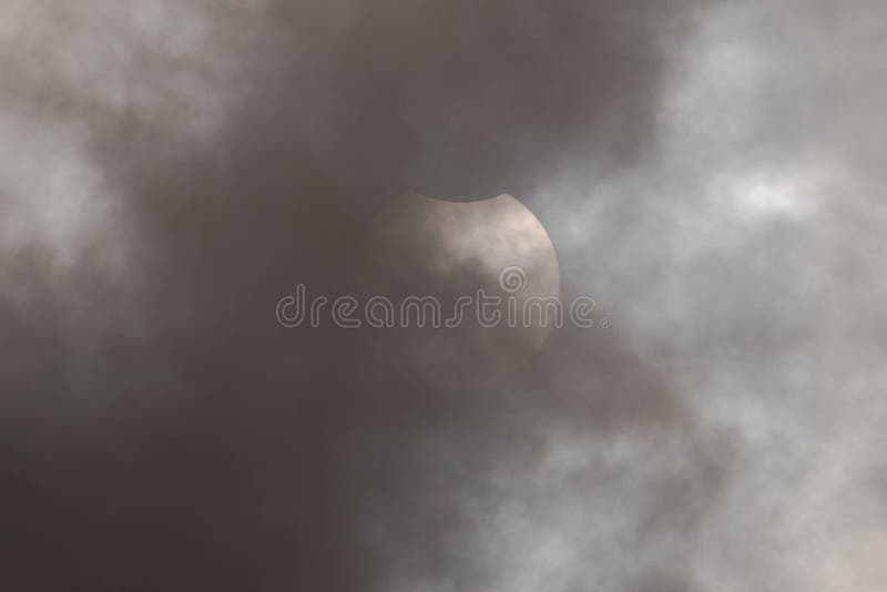 Solar Eclipse on a Cloudy Day. Stock Image - Image of phenomenon, layer ...