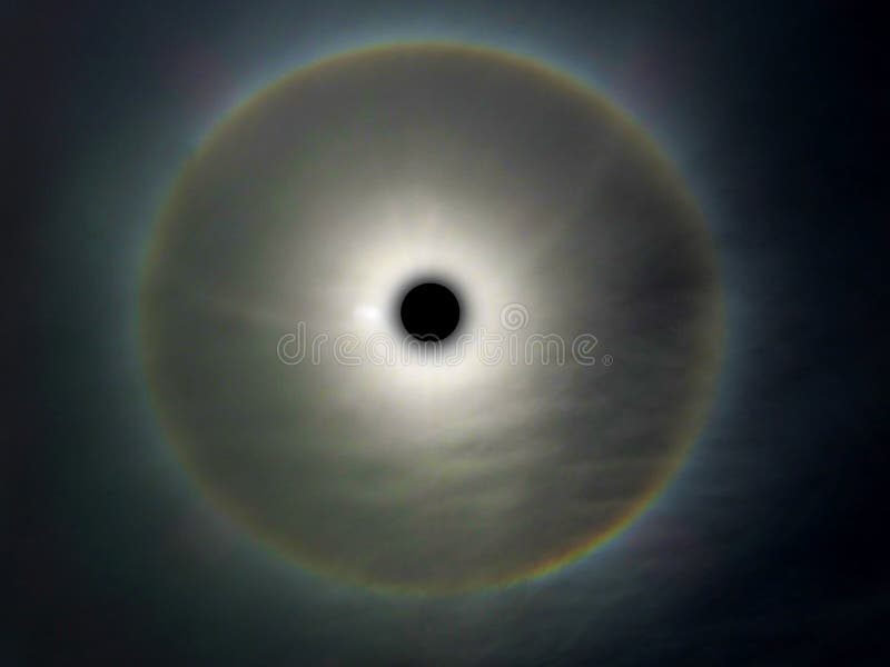 Solar Eclipse and Rainbow Ring Around in Dark Red Sky Stock Photo ...