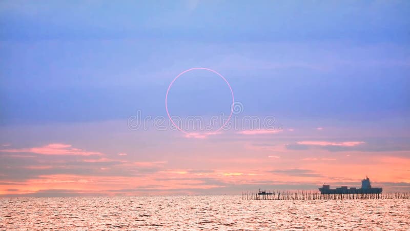 Solar Eclipse Red Sunset on the Ocean with Cargo Ship Red Orange Yellow ...