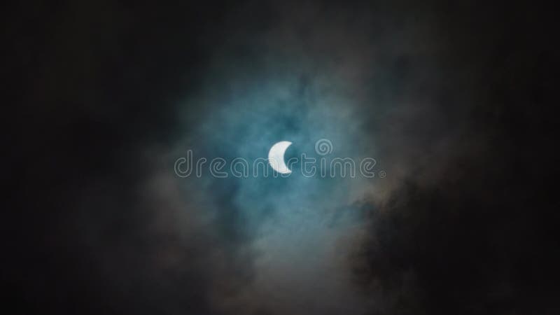 Solar Eclipse through Running Clouds Stock Video - Video of wonder ...