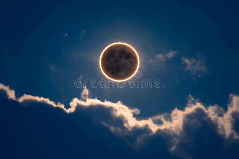 Solar Eclipse with Moons Shadow Framed by Glowing Golden Sun Rays Stock ...