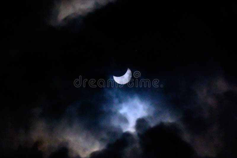 Solar eclipse in Toronto stock photo. Image of cover - 314623408