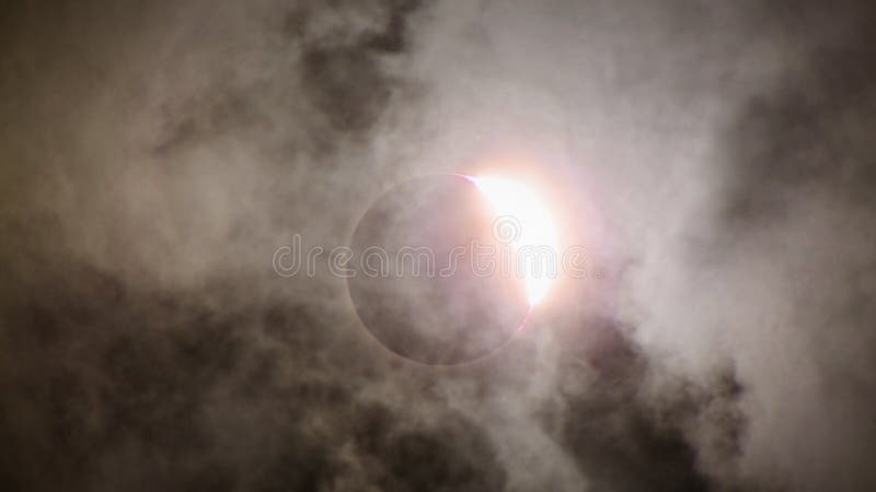 Solar Eclipse through Clouds 1 Stock Footage - Video of solar ...
