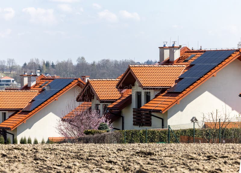 Solar Electric Panels on a House Roof. Stock Photo - Image of friendly ...