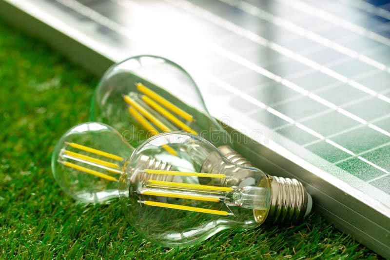 Solar Energy Panel and Light Bulb, Green Energy Concept Stock Photo ...